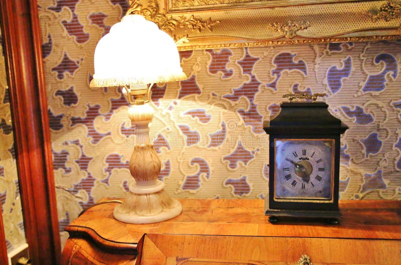Old lamp and clock stock photo. Image of concept, idea - 56643370