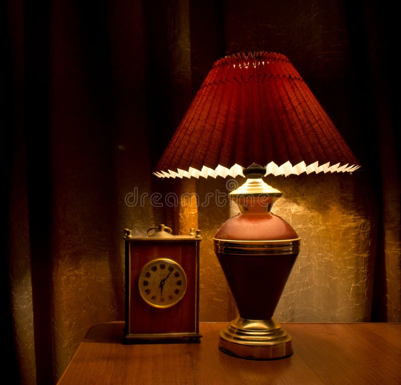 Old lamp and clock stock image. Image of brown, lantern - 66454825
