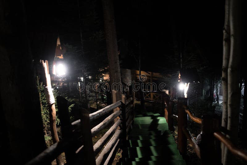 Old Lamp Made of Wood Chips Installed on Wooden Posts. an Ancient Lamp ...