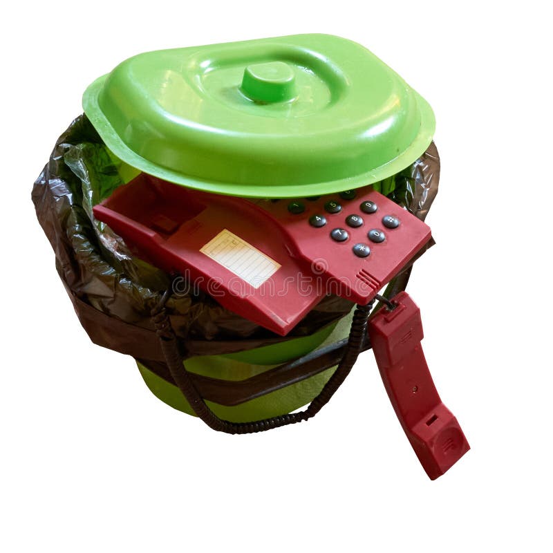 Old Landline Phone Thrown Into The Trash Bin. Isolated. White ...