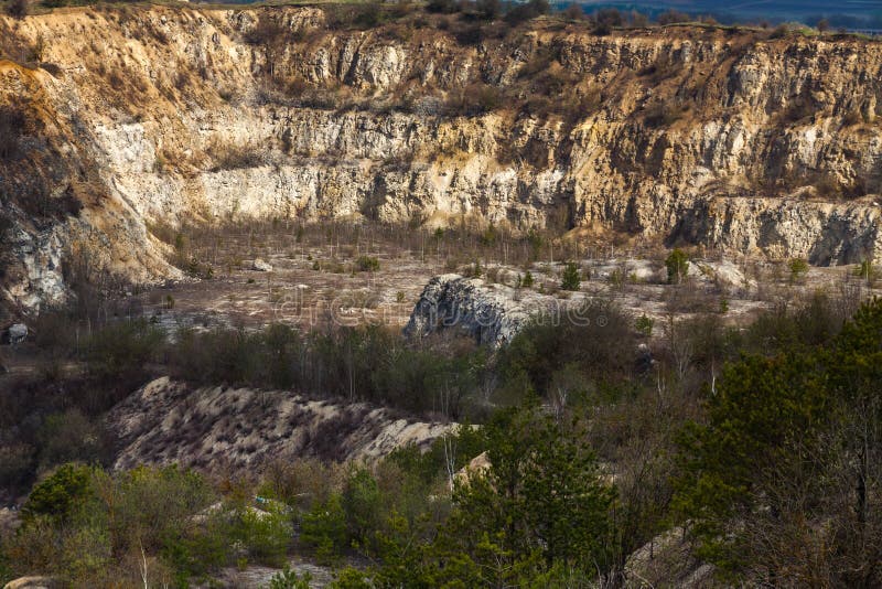 Old large abandoned quarry stock photo. Image of mountains - 145090938