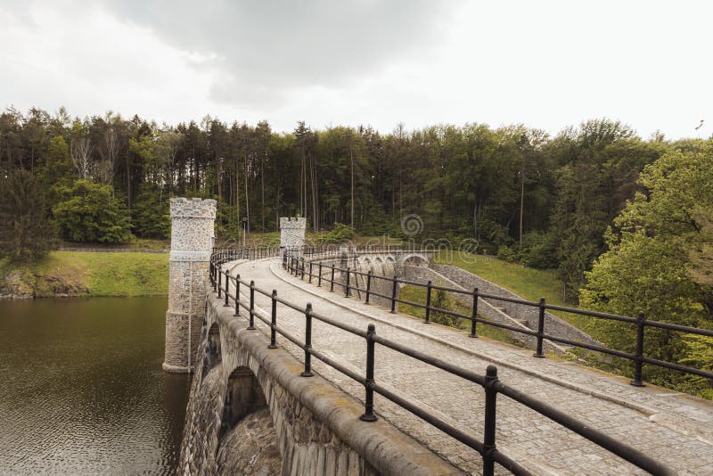 Old Large Stone Dam with Black Railing. Stock Photo - Image of outdoor ...