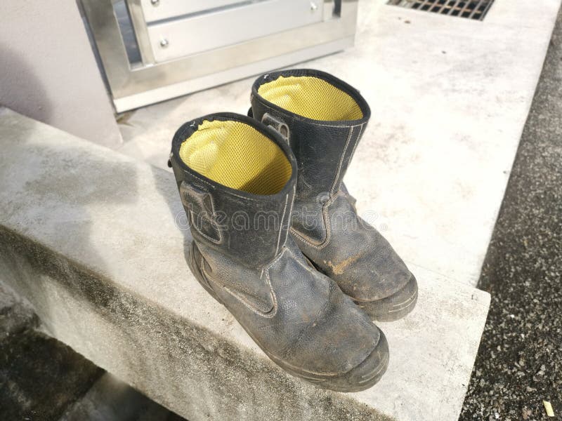 Old Leather Boot Drying on the Concrete Lap. Stock Photo - Image of ...