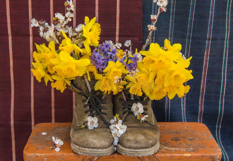 Old Leather Boot with Flower Inside Stock Photo - Image of decor ...
