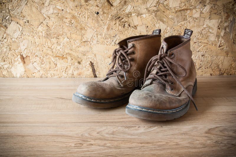 Old Leather Boot Traditional Leather Style on Wood Deck in Vintage ...