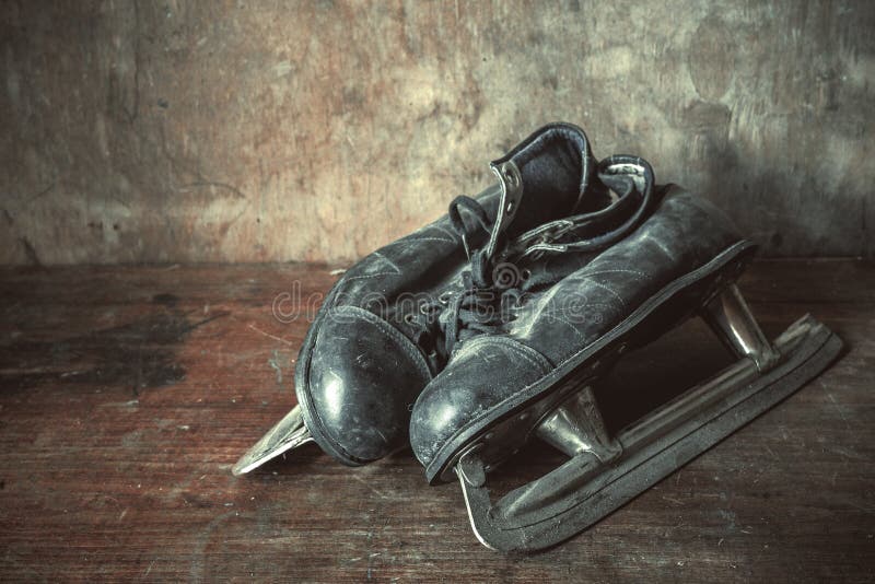 Old Leather Figure Skates in Black on a Retro Background Stock Photo ...