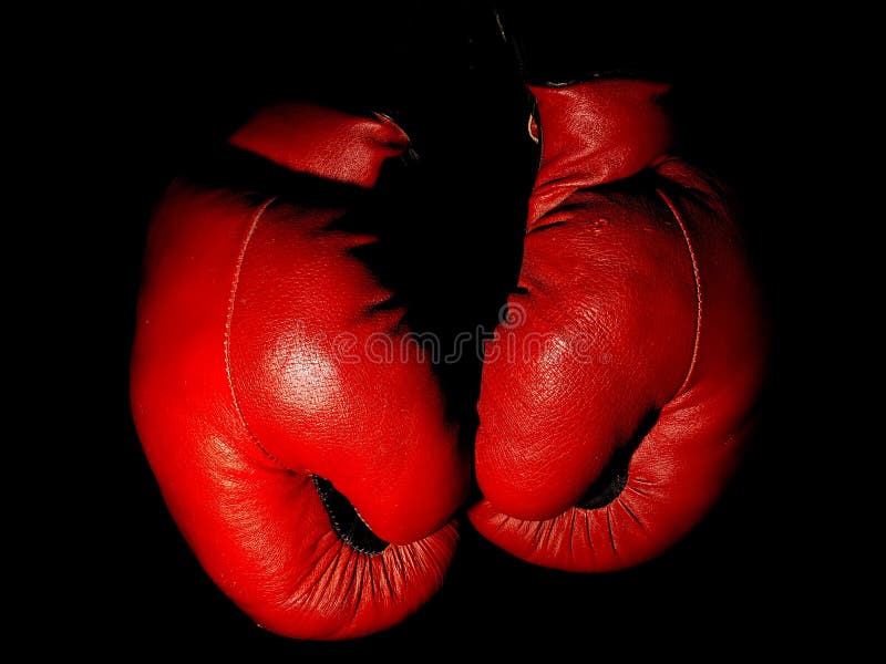 Old Leather Red Boxing Gloves Hanging in the Dark Stock Photo - Image ...