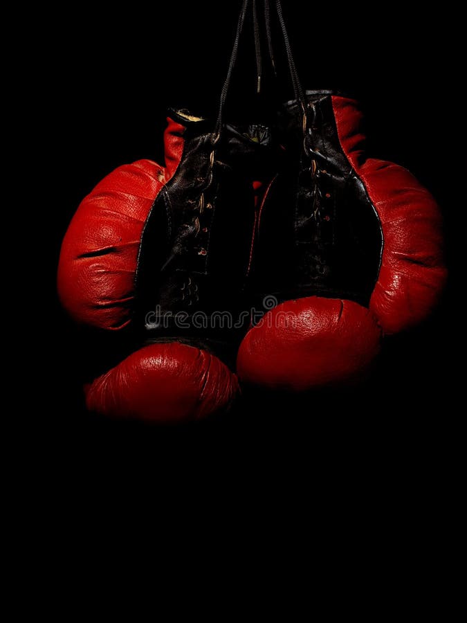 Old Leather Red Boxing Gloves Hanging in the Dark Stock Image - Image ...