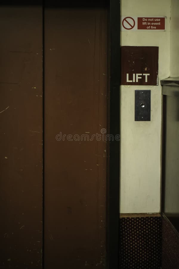 Old lift in a old build stock image. Image of panel - 110711103