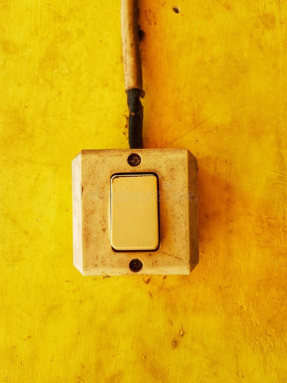 An Old Light Switch Stuck To the Wall Stock Photo - Image of stuck ...