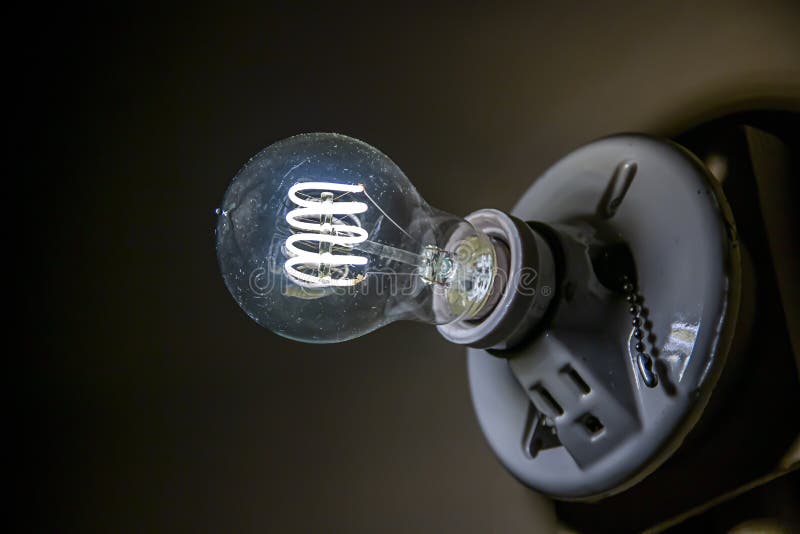 Old Lightbulb on the Wall of a Home Stock Image - Image of steel, bulb ...