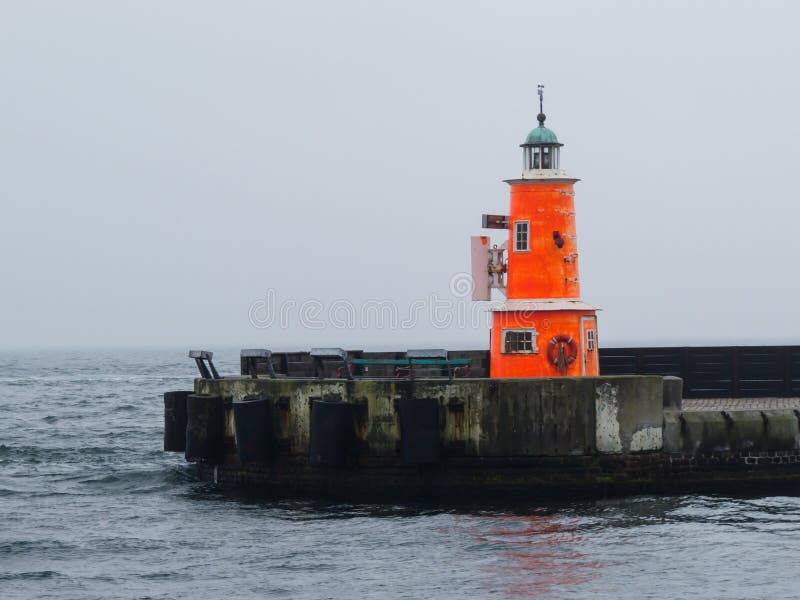 Old lighthouse, Denmark stock image. Image of gulf, orange - 64274009