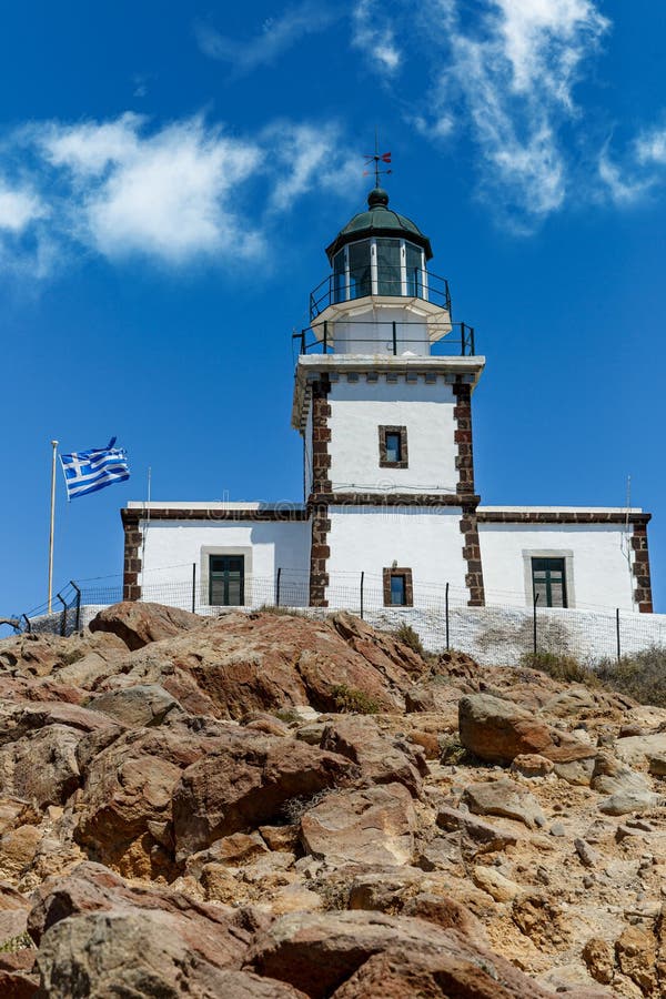 Old Lighthouse with Greece Flag on Blue Sky Background. Stock Image ...
