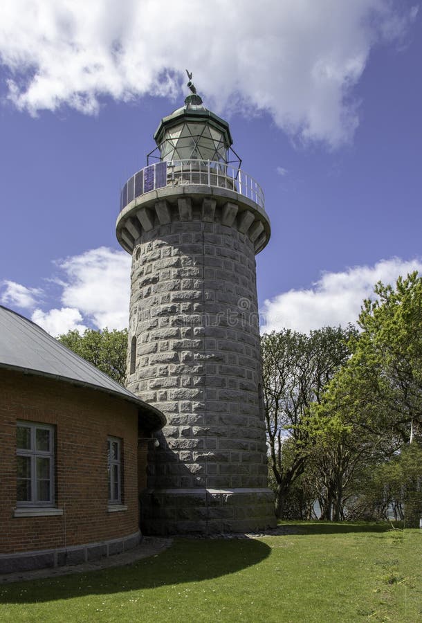Lighthouse at Apple Island stock image. Image of iceland - 147939963