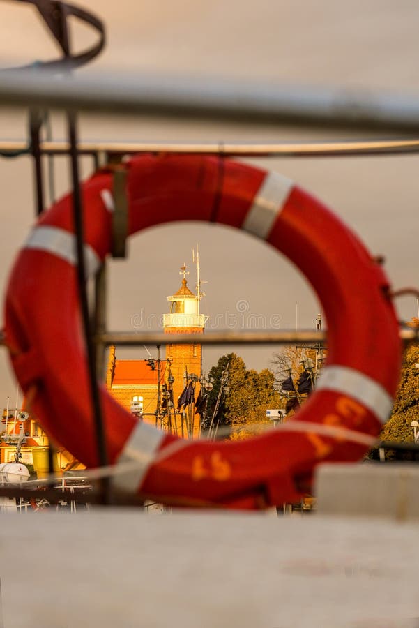 Old Lighthouse View through a Life Belt Editorial Photo - Image of ...