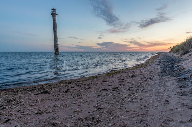 A Lighthouse in Warm Morning Light Stock Image - Image of sunrise, warm ...