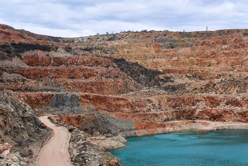Old Limestone Quarry with a Blue Lake at the Bottom Stock Photo - Image ...