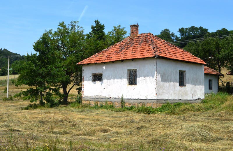 Old little white farmhouse stock image. Image of farmhouse - 262453443