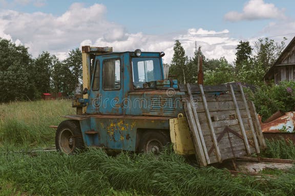 Old Loader Car in a Green Yard. Stock Image - Image of truck, pallet ...
