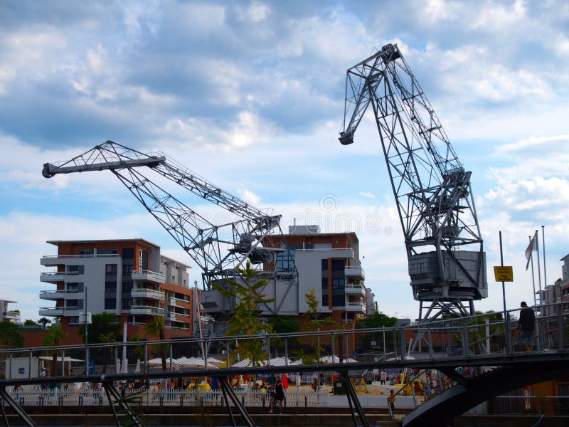Old loading cranes stock image. Image of clouds, quay - 157660819