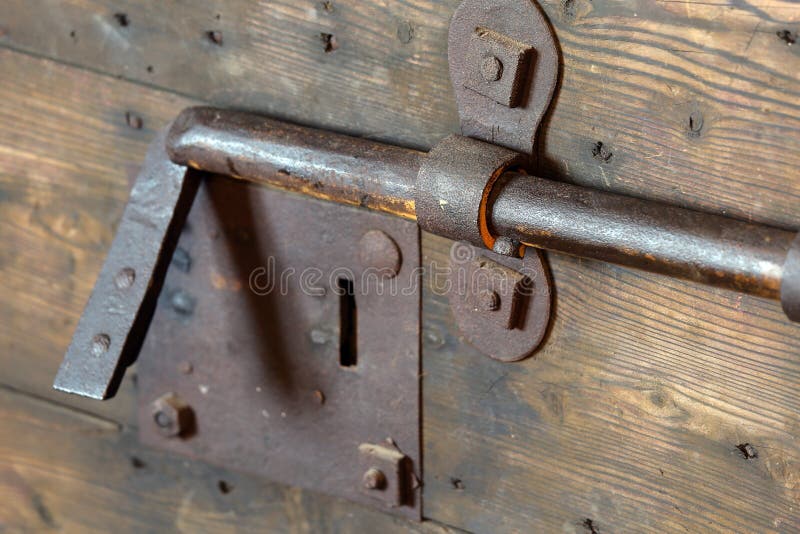 Old Lock with Big Deadbolt To Close the Door of the Castle Stock Image ...