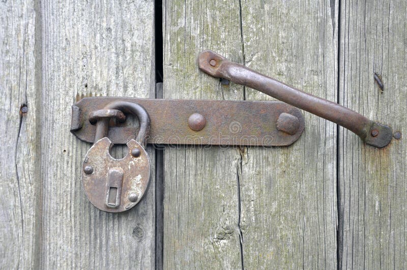 Old Lock on the Door. Locking Device of an Old Farmhouse. Background ...