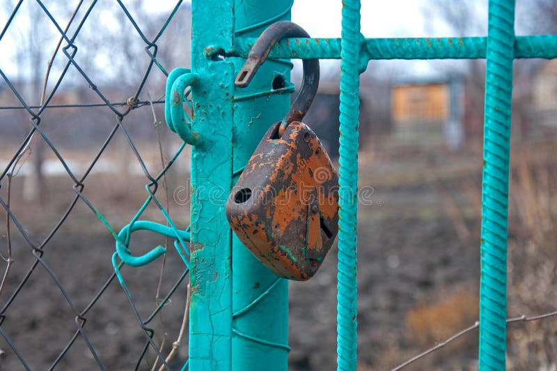 Old lock at the metal gate stock image. Image of closeup - 247107917