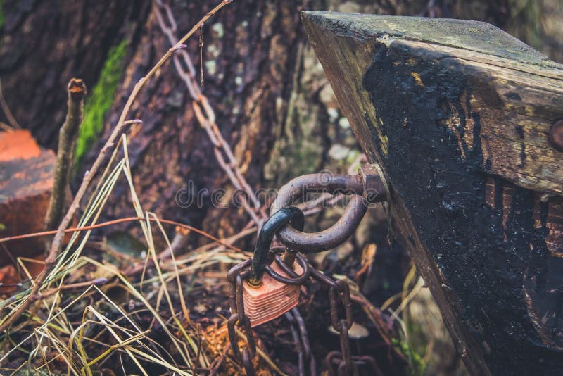 Old Lock and Rusty Chain on a Wooden Boat Stock Photo - Image of safety ...