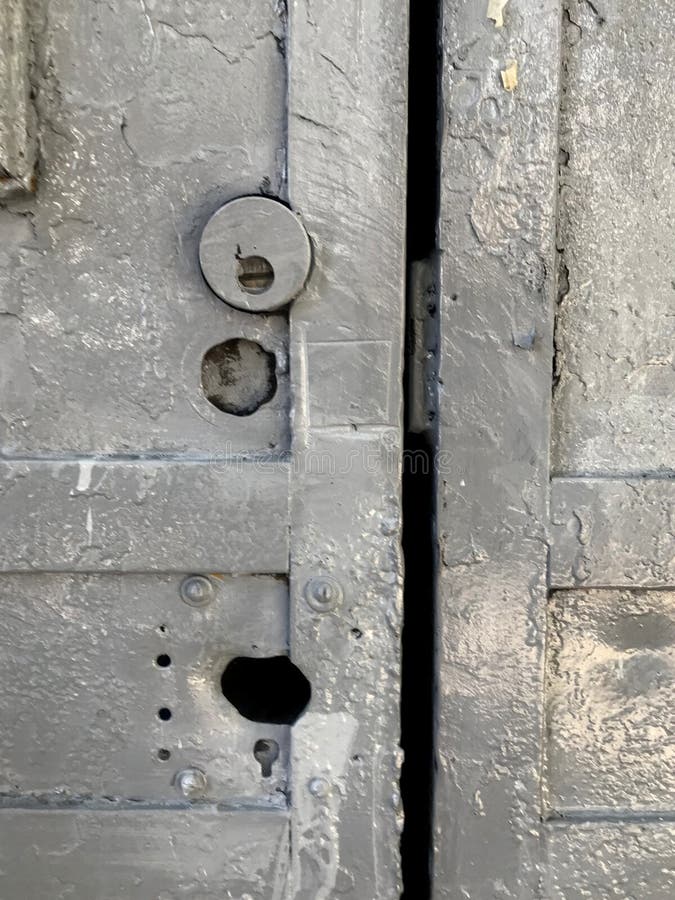 Old lock on a wooden door stock image. Image of detail - 319420555