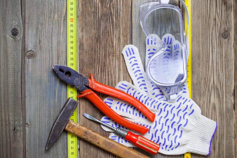 Old Locksmith Tools, Work Gloves, Safety Glasses and Measuring Tape on ...