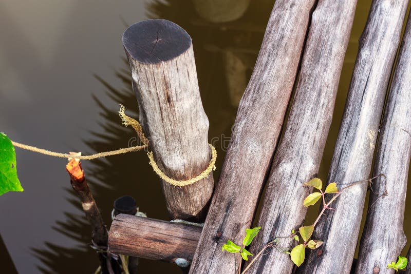 Old Log Bridge and Log for Mooring. Stock Photo - Image of empty, boat ...