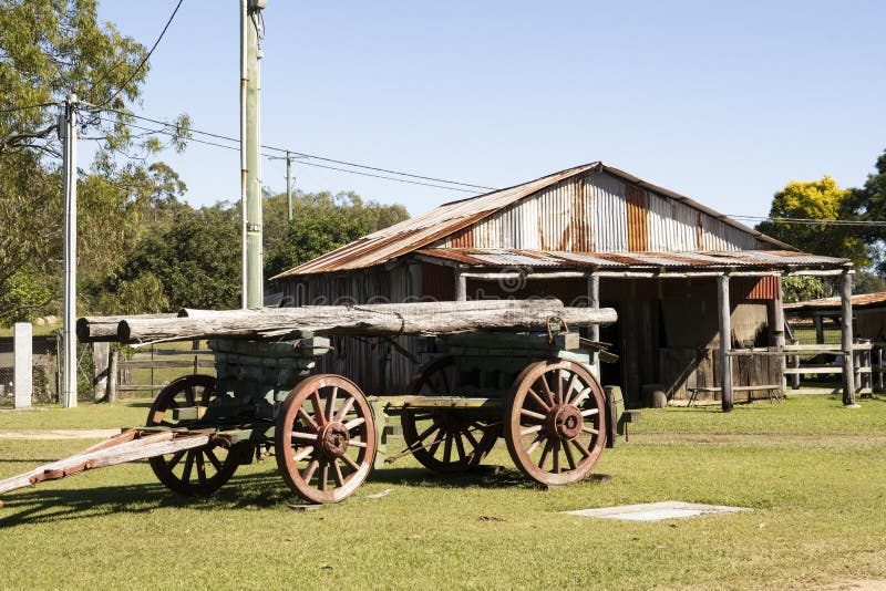 Old Logging Wagon and Shed. Stock Photo - Image of vintage, grass ...