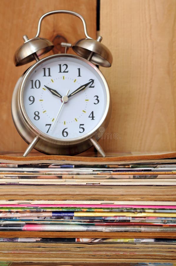 Old Magazine and Old Bell Clock Stock Photo - Image of retro, bookshelf ...