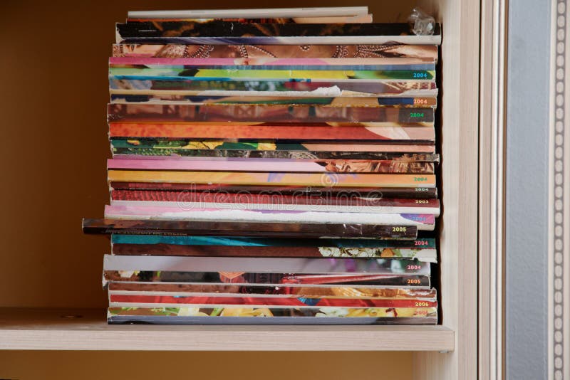 Old Magazines Stacked on a Shelf in the Closet Stock Image - Image of ...