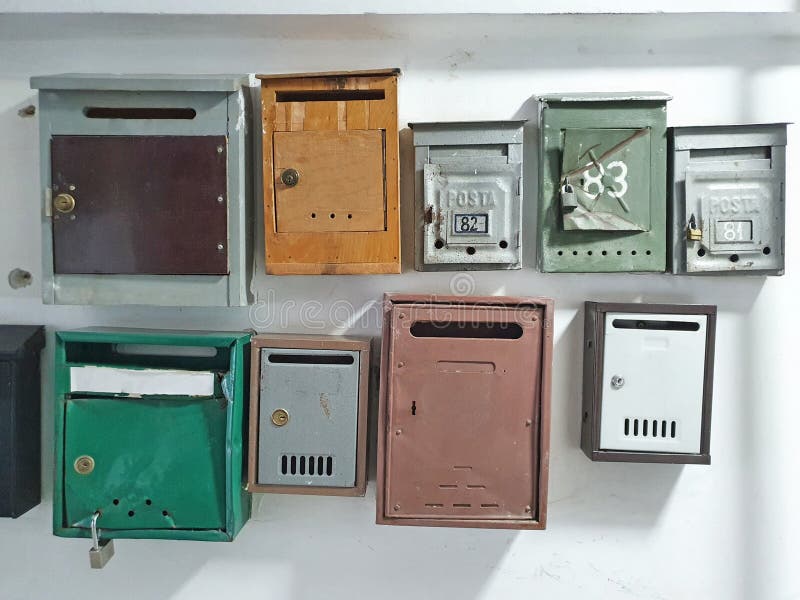 Old Mail Boxes on a White Wall Stock Image - Image of arranged ...