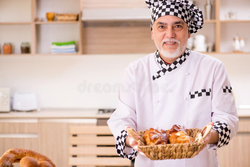 The Old Male Baker Working in the Kitchen Stock Photo - Image of baker ...