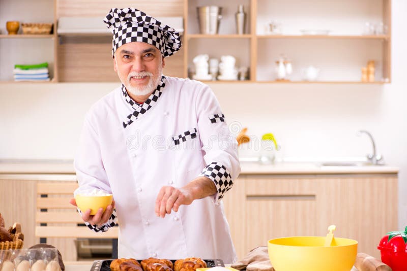The Old Male Baker Working in the Kitchen Stock Image - Image of ...