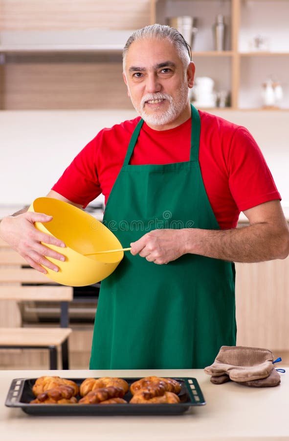 Old Male Baker Working in the Kitchen Stock Photo - Image of doughnut ...