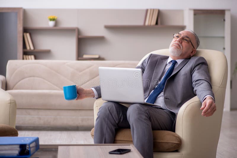 Old Male Boss Working from Home during Pandemic Stock Photo - Image of ...
