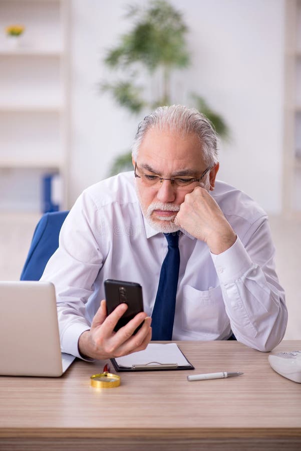 Old Male Boss Working at Workplace Stock Image - Image of explaining ...