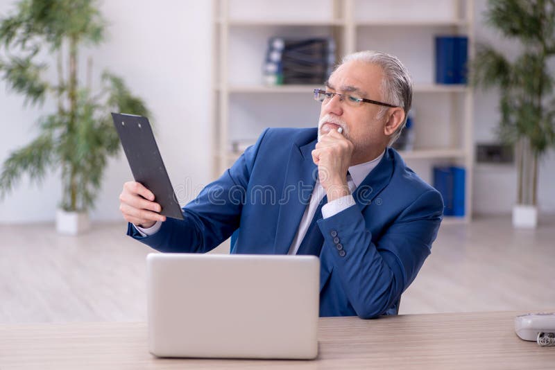 Old Male Boss Working at Workplace Stock Image - Image of manager, busy ...