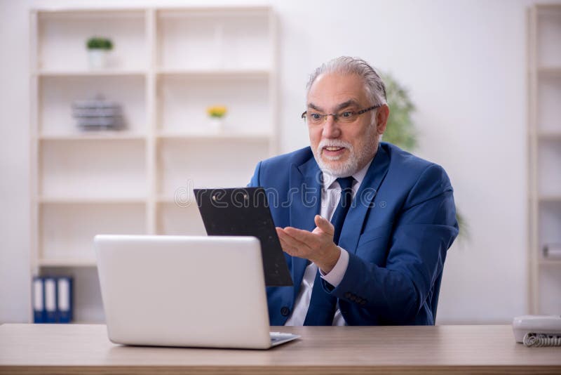 Old Male Boss Working at Workplace Stock Image - Image of office, note ...