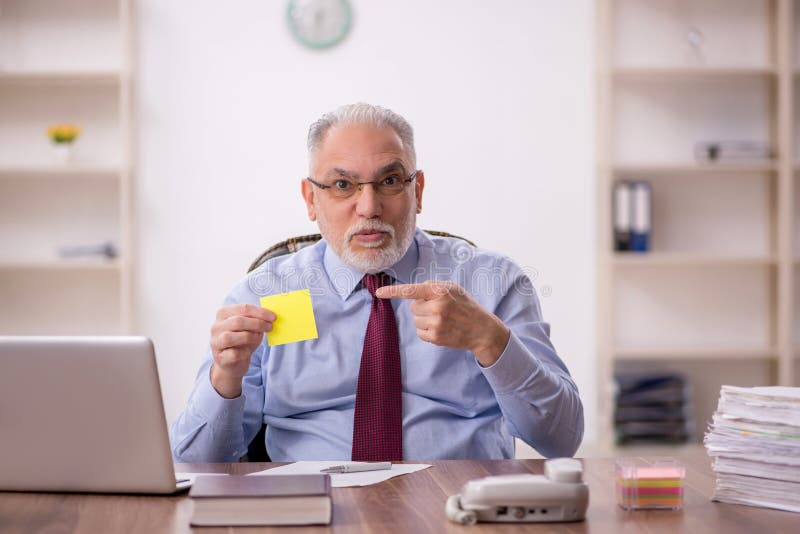 Old Male Boss Working at Workplace Stock Photo - Image of note ...