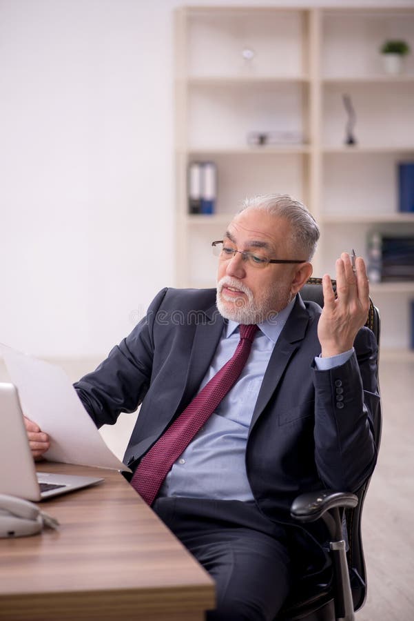 Old Male Boss Working at Workplace Stock Image - Image of businessman ...