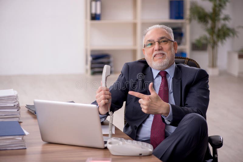 Old Male Boss Working at Workplace Stock Image - Image of desk ...