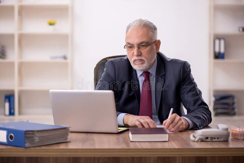 Old Male Boss Working at Workplace Stock Photo - Image of office ...