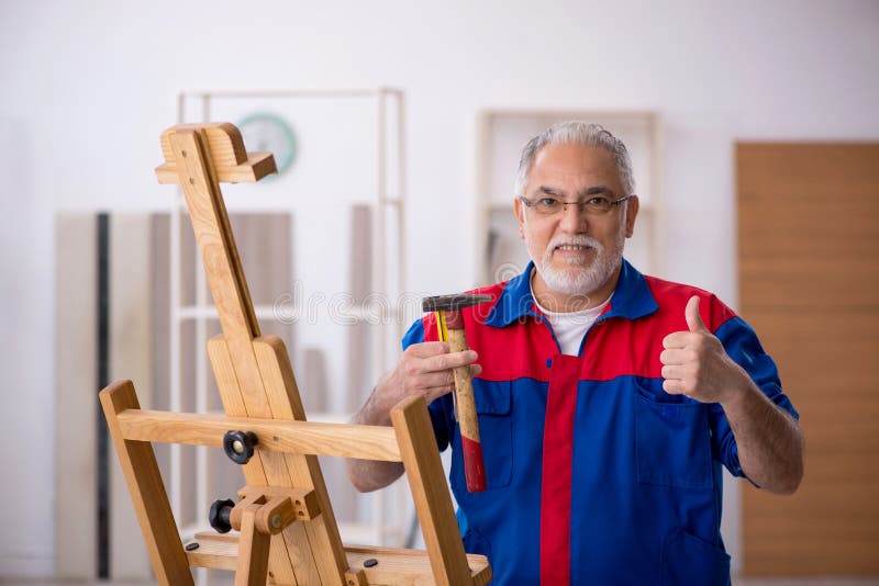 Old Male Carpenter Repairing Drawing Easel Stock Photo - Image of ...