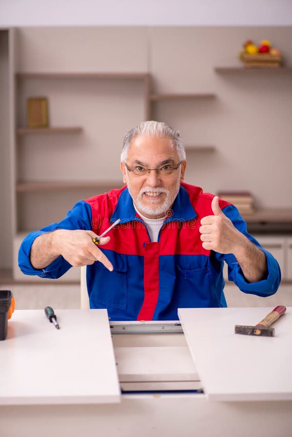 Old Male Carpenter Working Indoors Stock Image - Image of thumbs ...