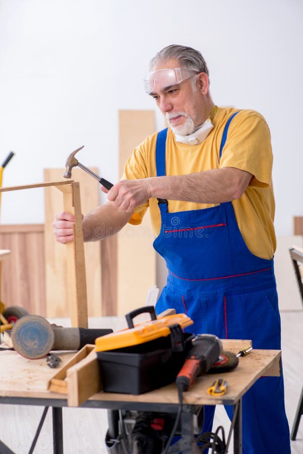 Old Male Carpenter Working in Workshop Stock Image - Image of repair ...