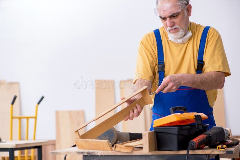 Old Male Carpenter Working Indoors Stock Image - Image of fixing ...
